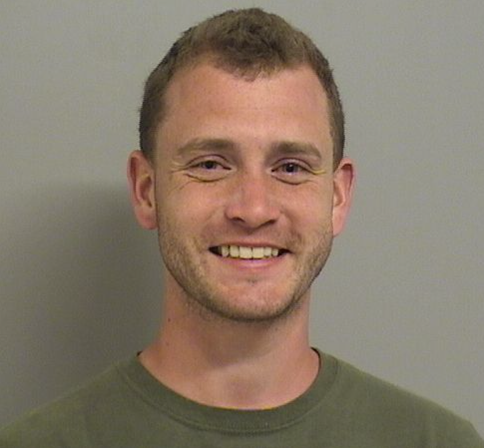 Owasso man turns his frown upside down during jail booking - JAILBIRDS
